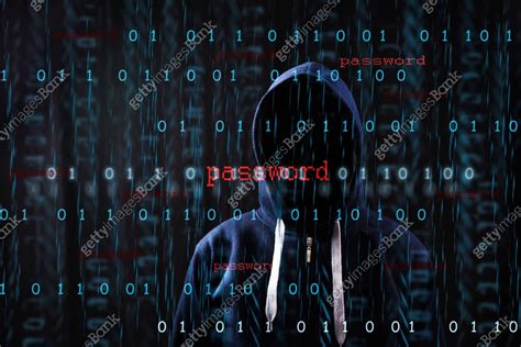 Computer Hacker With A Hood Touches The Touch Screen Binary Code Light