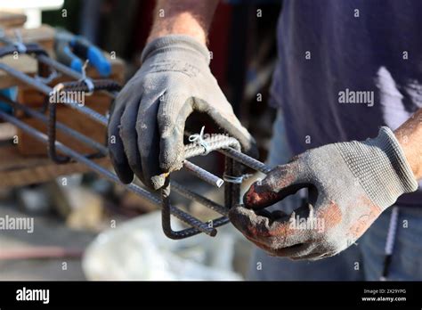 Hand Holding Reinforcement Steel Professional Construction Worker