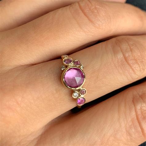 Asymmetrical Cluster Rings Emily Amey