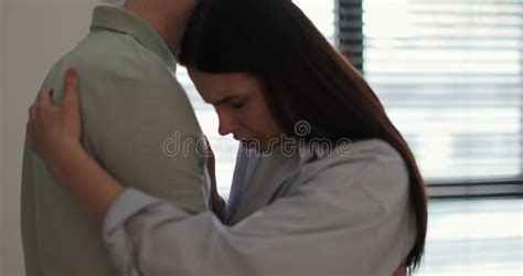 A Married Couple Reconciles After A Fight They Hug The Woman Is Crying Relationship Crisis