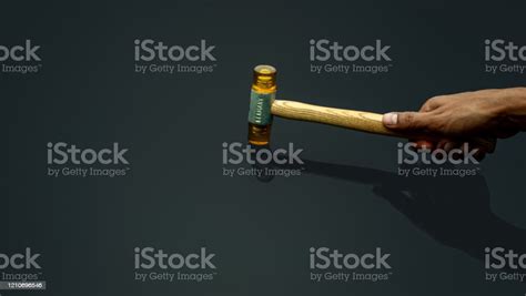 Mans Hand Holding Plastic Hammer Isolated On Dark Background Male
