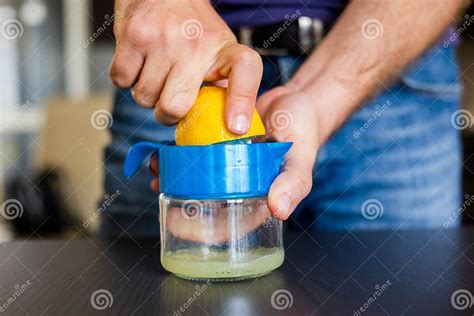 Man Squeezing Lemon Juice Closeup Stock Image - Image of freshness, health: 256412721