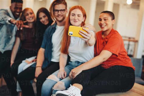 Multi Ethnic Group Of Babes Making A Selfie In Classroom Male And Female Babes Taking