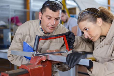 Female Worker Cutting Box Section Steel Stock Image Colourbox