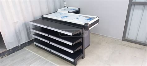 სალარო მაგიდის წინა თარო ცალმხრივი სტელაჟი მეორადი და ახალი ნივთების ყიდვა გაყიდვის