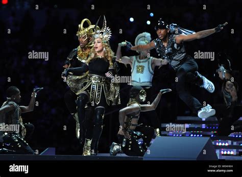 Madonna Performs During The Halftime Show At Super Bowl Xlvi Between