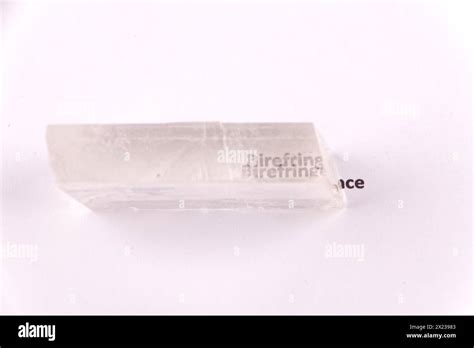 Optical Birefringence Demonstrated Using A Text Using A Natural Double Spar Calcite Crystal