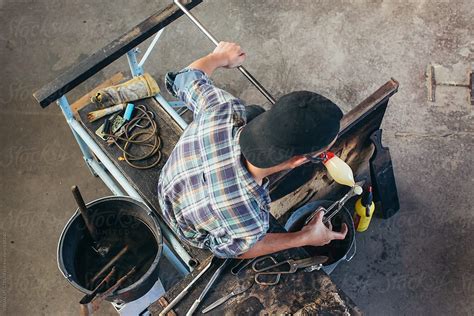 Overhead Shot Of Anonymous Male Glass Artist By Stocksy Contributor