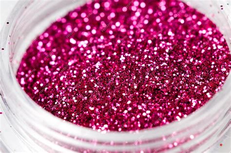 Premium Photo Colored Sequins In A Plastic Jar Closeup