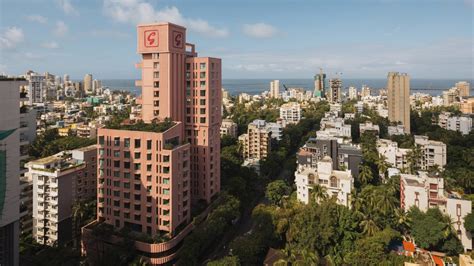 Nudes Clads Mumbai Apartment Building With Pink Fluted Concrete