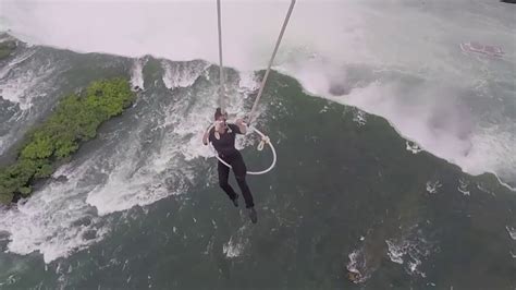 Erendira Wallenda Hangs from her Teeth over Niagara Falls in Canada - YouTube