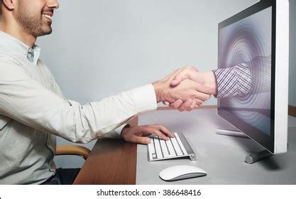 Hand Through Computer Screen Photos And Images Shutterstock