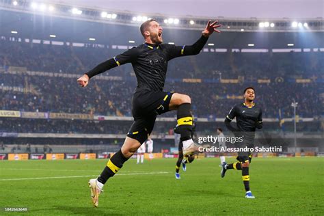 Thomas Henry Of Hellas Verona Fc Celebrates Scoring Their Teams