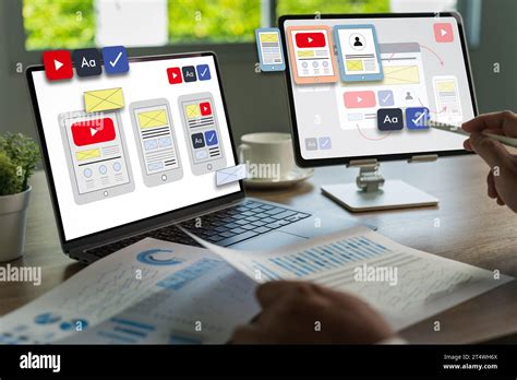 Team Designers Work On Ui And Ux Designs For Mobile App Technology Digital Interfaces Mobile