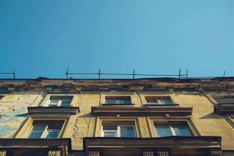 top of old apartment building with metal projectiles premium ai