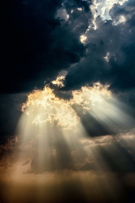 Download Beautiful Clouds With Sun Rays Wallpaper