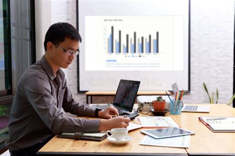 Small And Medium Enterprise Business Concept Of Businessman Using Calculator To Calculate