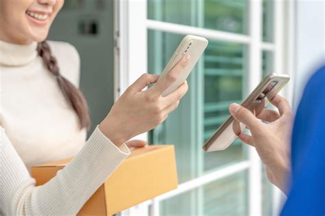 Happy Smile Asian Woman Scan QR Code For Pay Of Food Delivery Man Send Deliver Express Online