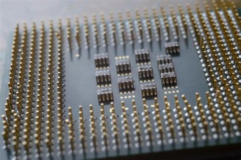 Premium Photo Microprocessor From The Computer Lies On The Motherboard Closeup