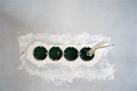 Premium Photo Boxes For Installing Sockets With Protruding Wires A White Wall Installing Sockets