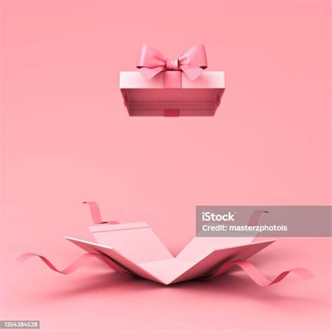 깜짝 선물 상자 또는 빈 핑크 파스텔 컬러 선물 상자 핑크 리본과 리본으로 묶여 있는 리본과 리본은 그림자 최소한의 개념으로