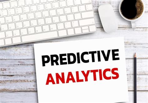 Business Quotes Predictive Analytics On Notebook Or Paper In Office