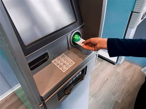 Woman Withdrawing Cash At ATM Withdraw From Bank Account Using Debit Card Secure Banking Cash