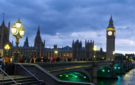 A Bridge With A Clock Tower In The Background Photo Free Westminster