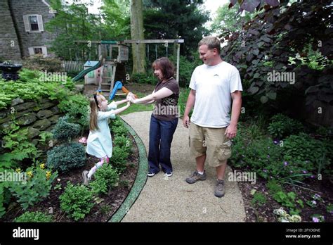 Natalie Bauder Plays In Her Alice In Wonderland Garden With Her