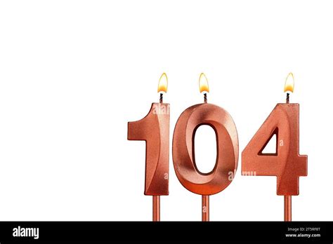 Burning candle number 104 for birthday on white background Stock Photo ...