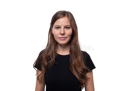 A Well Groomed Brown Haired Woman With A Model Appearance Is Wearing A