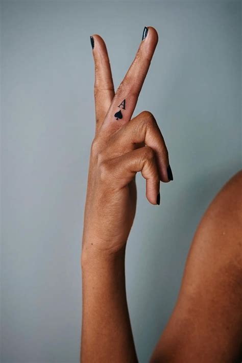 55 Unique Small Finger Tattoo Ideas