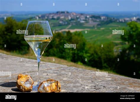 Glasses Of White Wine From Vineyards Of Sancerre Chavignol Appelation And Example Of Flint