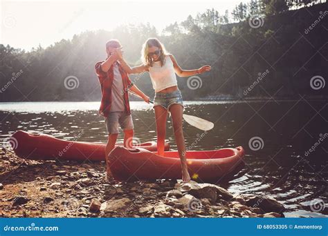 Couple After The Canoe Ride Stock Image Image Of Assistance Female