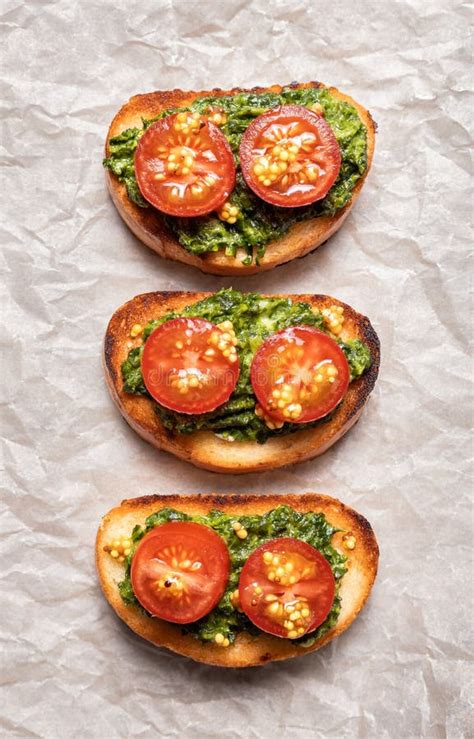 Sandwiches On Toasted White Bread With Spinach Cheese Decorated With