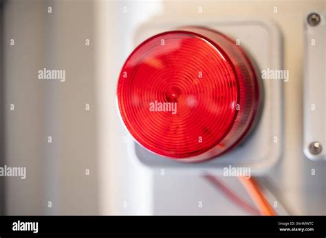 Closeup View Of A Bright Vivid Red Alert Light Which Is Ideal For Signaling Safety And