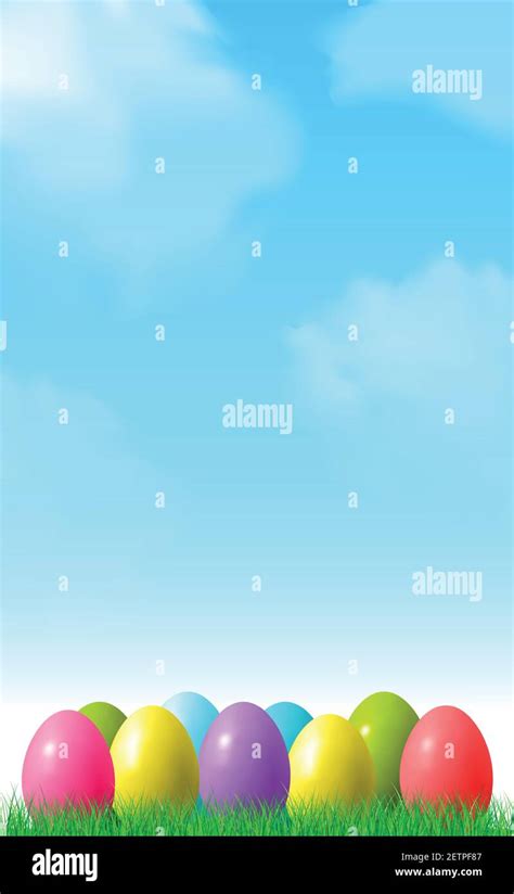 Abstract Easter Bokeh Background With Colorful Eggs Lying On The Grass Against The Sky