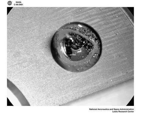 Sample Cell Germanium Overflow Of The Diffusion Process In Molten Semiconductor Flight Sample Cell Germanium Overflow Of The Diffusion Process In Molten Semiconductor Flight