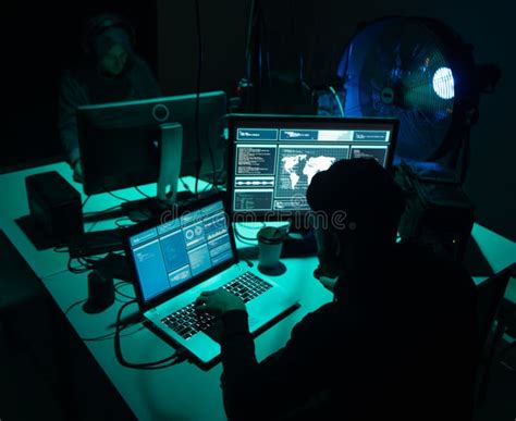 Wanted Hackers Coding Virus Ransomware Using Laptops And Computers