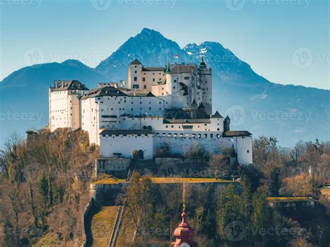 Hohensalzburg Fortress Atop A Hill In Salzburg Austria With White