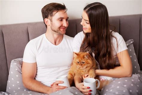 Happy Couple Having Fun In Bed Intimate Sensual Young Couple In