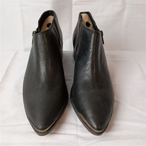 Sleek and stylish Lucky Brand black leather booties... - Depop