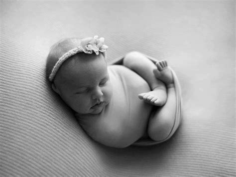 Safe Posing Of A Newborn On Their Back By Brisbane Best Newborn Photographer