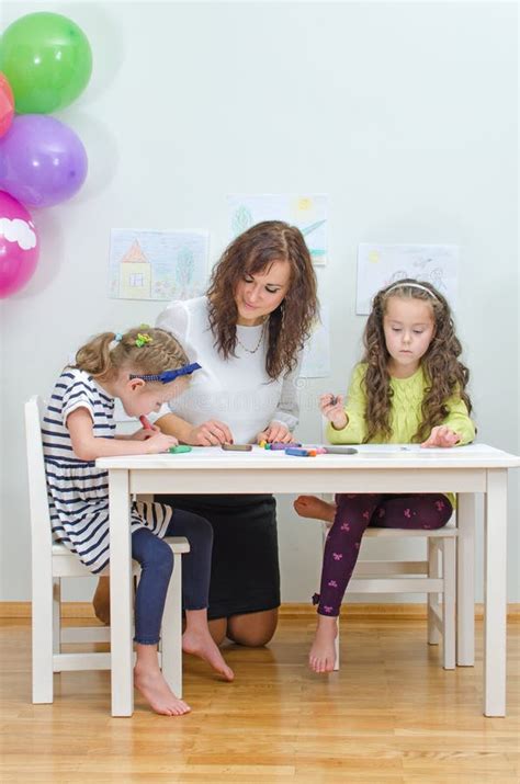 Teacher With Two Girls Stock Image Image Of Draw Classroom 35548355