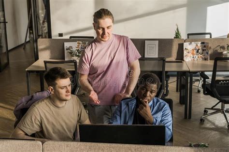 Programmers Working In The Office Of A Software Development Company