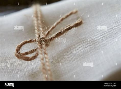 Twine Tied In A Bow Close Up Fabric Background Stock Photo Alamy