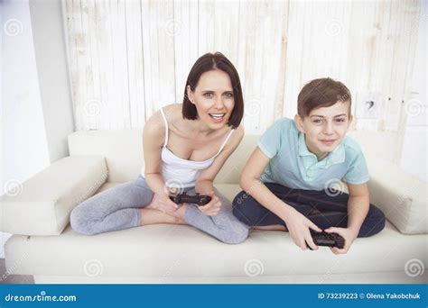 Mother And Her Adult Son Playing On Console Stock Image Image Of Casual Lifestyle 73239223