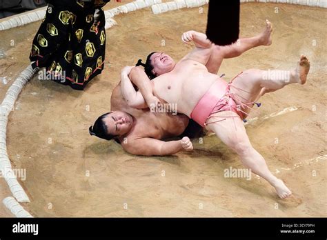 Ura Battles With Shonannoumi In The Makuuchi Division Bout On Day Three Of The Grand Sumo
