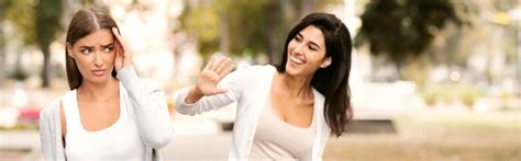 Premium Photo Shy Girl Avoiding Meeting Friend Having Communication