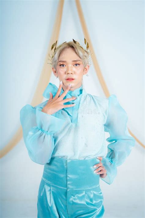 A Princess With A Blue Dress And Blonde Hair Posing Very Beautifully Stock Image Image Of Blue